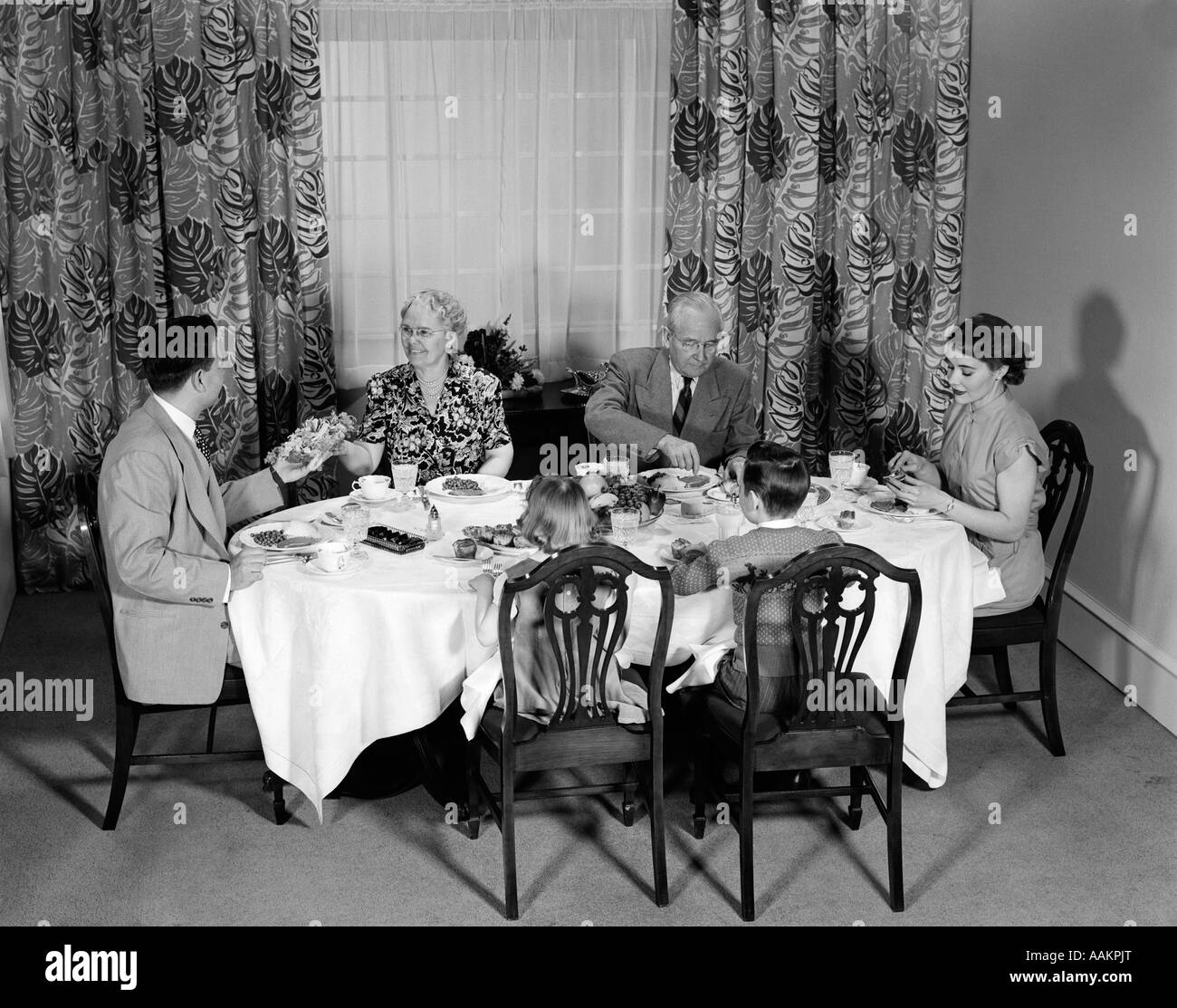 1950s THREE GENERATION FAMILY DINNER Stock Photo - Alamy