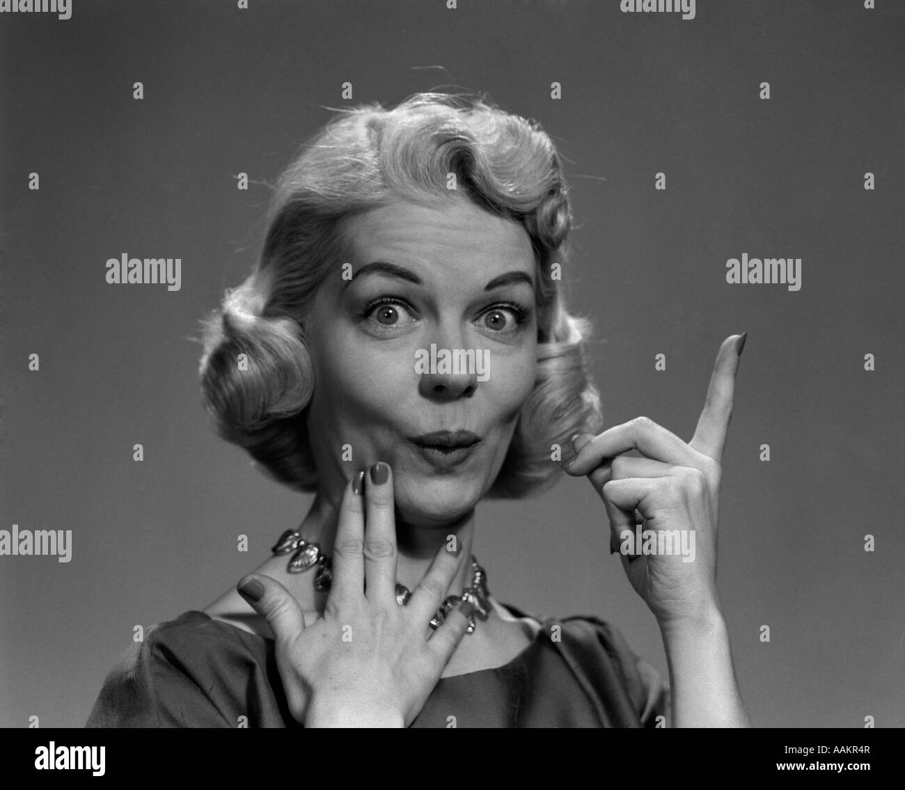 Woman hand finger pointing Black and White Stock Photos & Images - Alamy