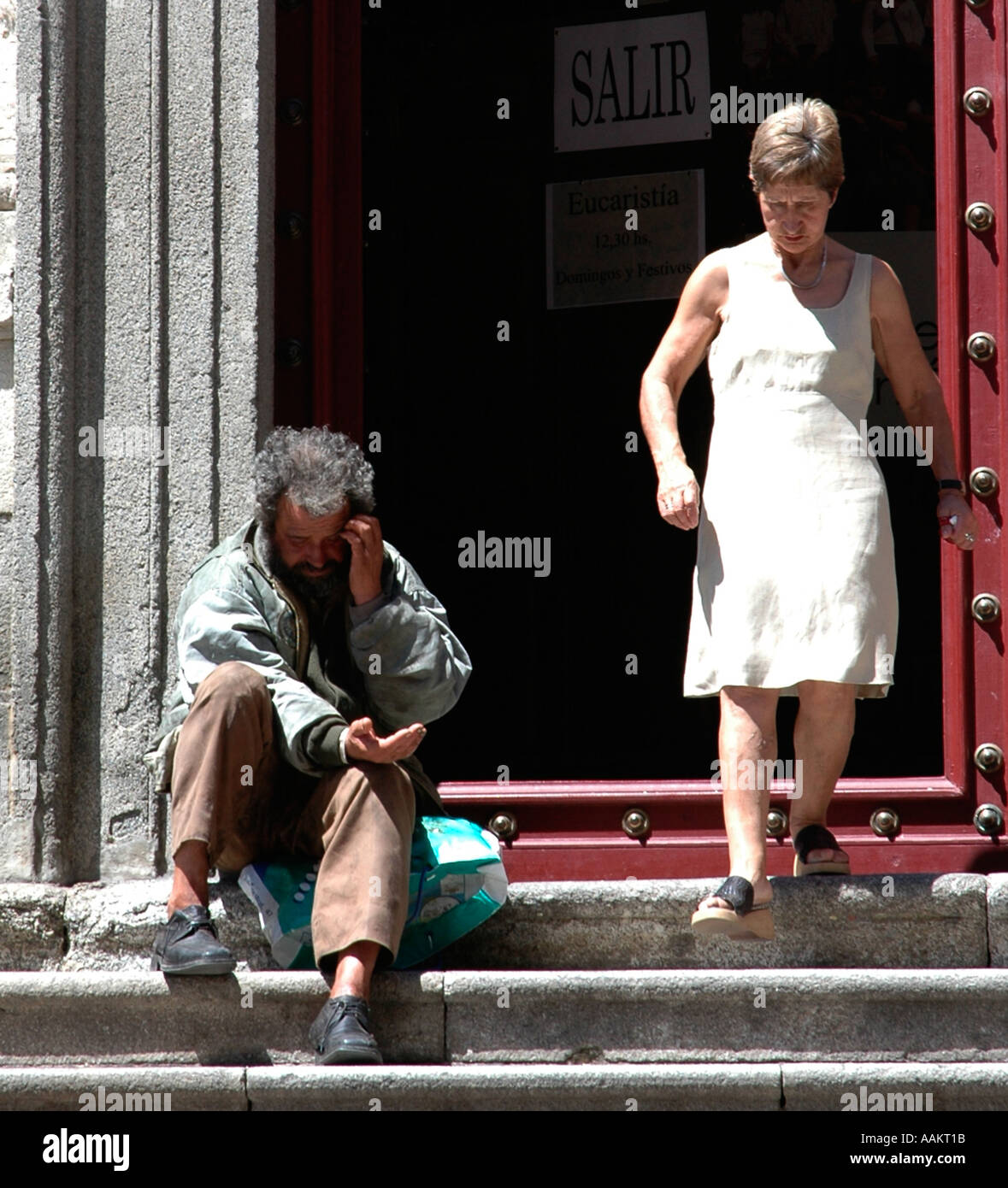 Beggar woman walks hi-res stock photography and images - Alamy
