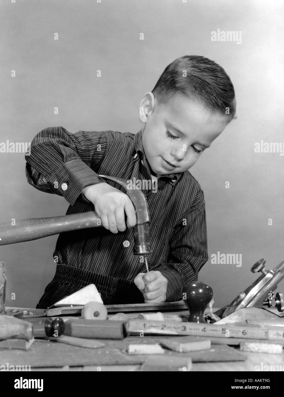 Kid boy playing in Black and White Stock Photos & Images - Alamy