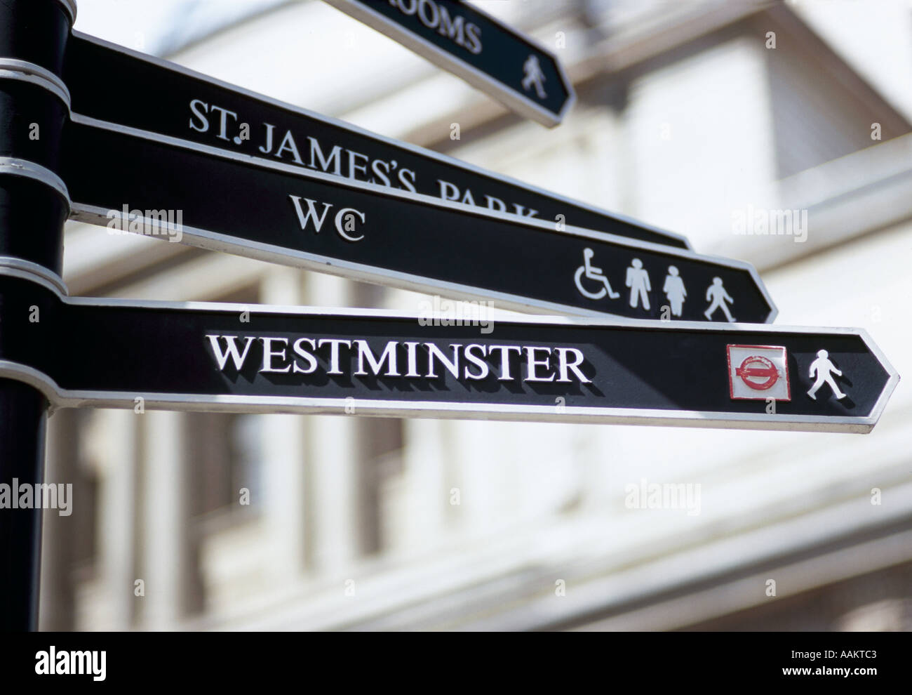 London pedestrian signpost to Westminster and toilet Stock Photo - Alamy