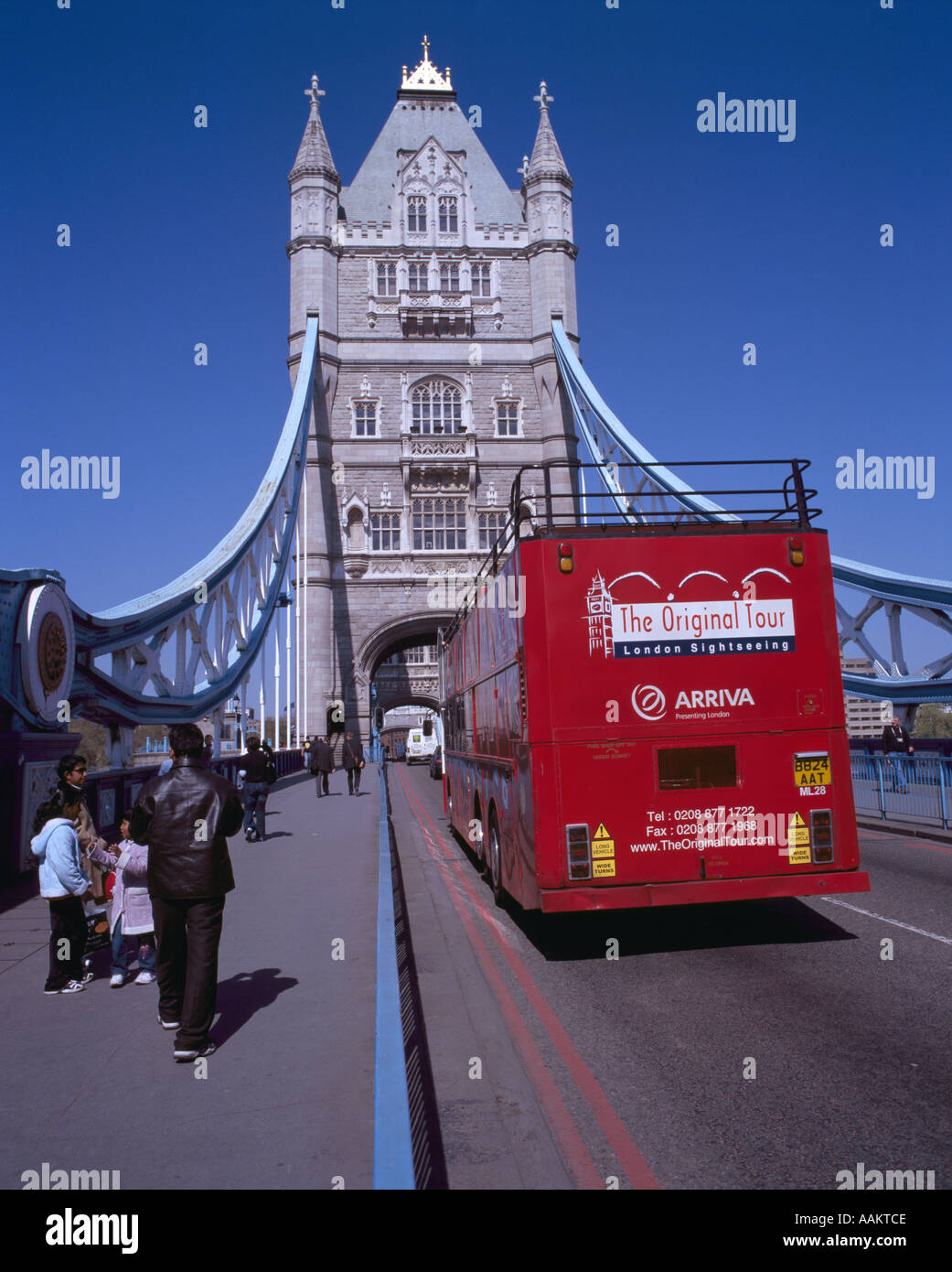 Open top tourist bus crossing Tower Bridge London Stock Photo - Alamy