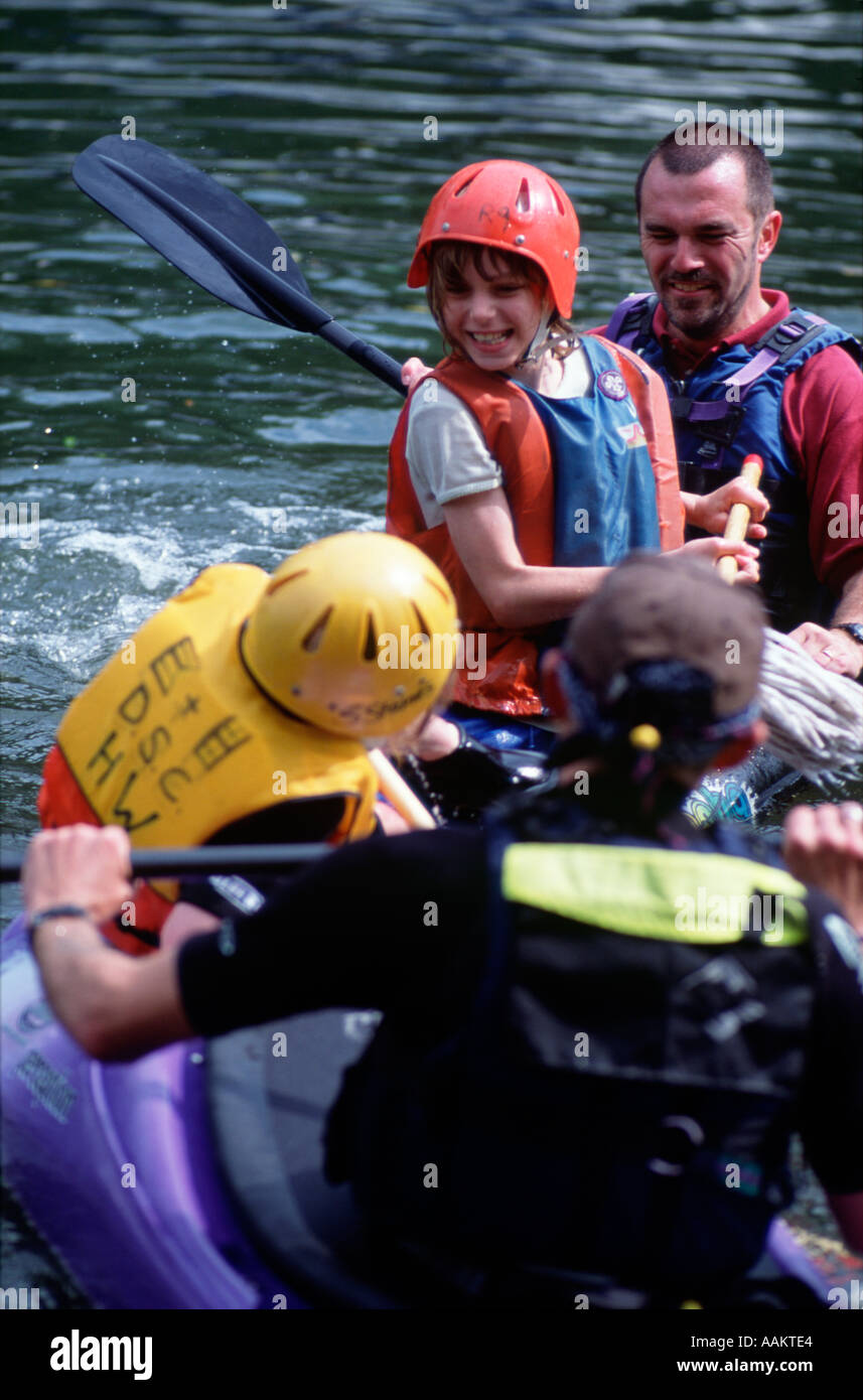 Cub Scouts aged 10 to 12 years play mop jousting in canoes on River ...