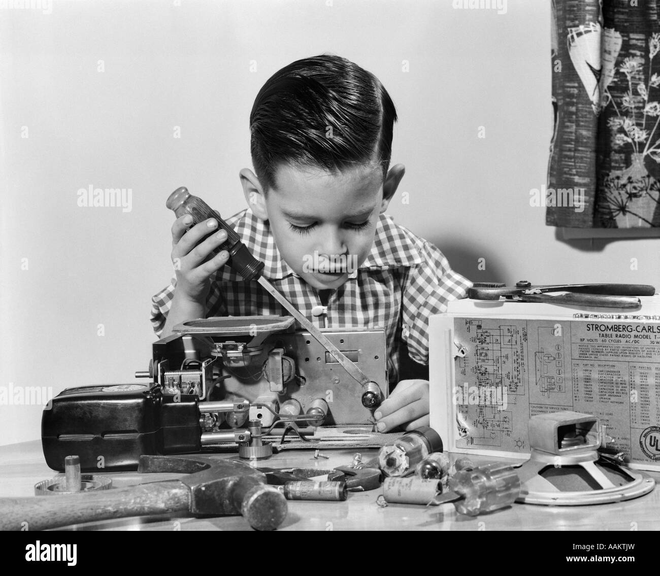 1950s BOY SCREW DRIVER PUTTING TOGETHER TAKING APART RADIO Stock Photo ...