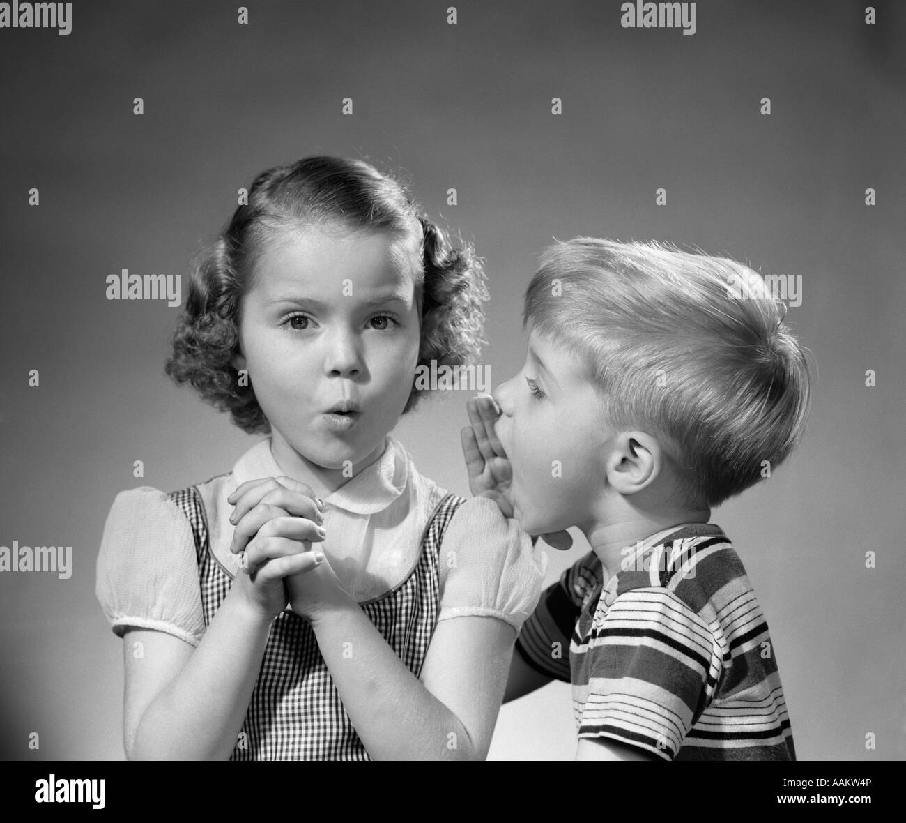 Whispering Black and White Stock Photos & Images - Alamy