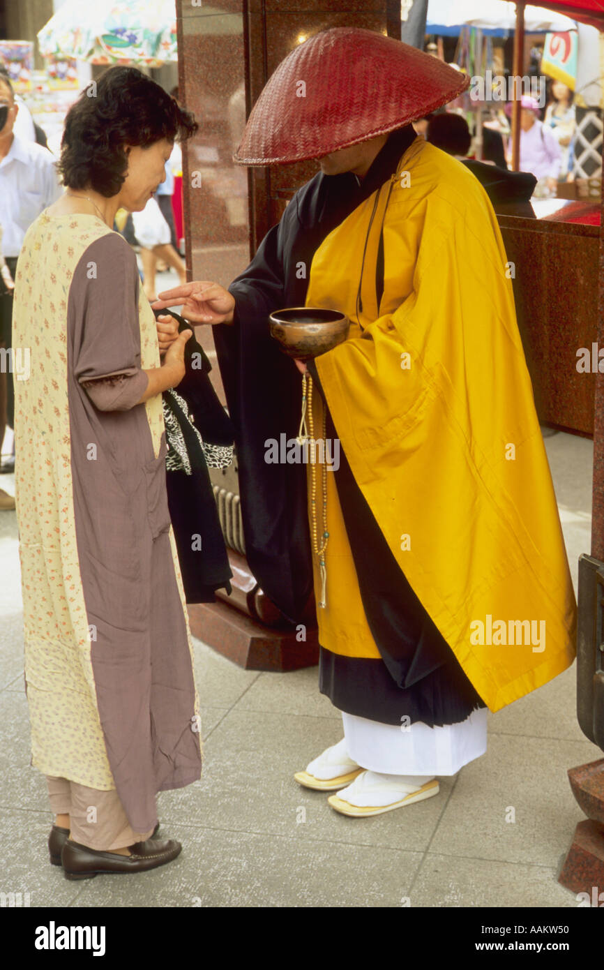 Japan Tokyo buddhist monk blessing Stock Photo - Alamy