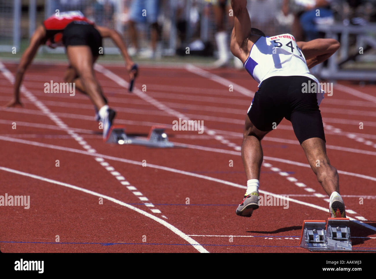 Relay race runners hi-res stock photography and images - Alamy