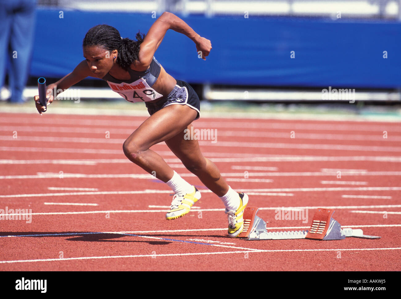 African woman runner relay hi-res stock photography and images - Alamy