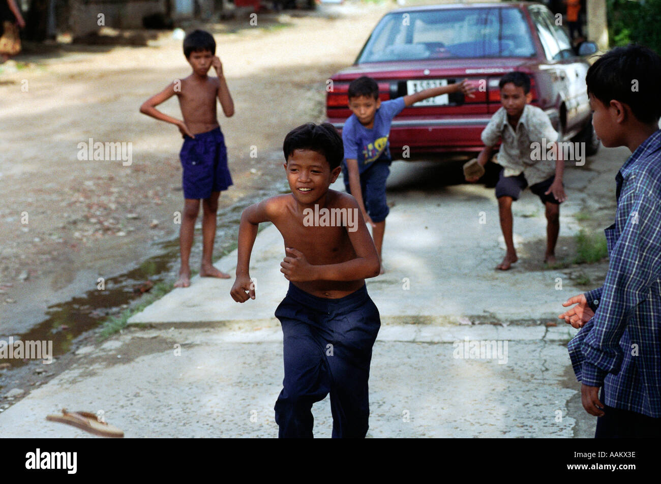 Phnom Penh boys playing Stock Photo - Alamy