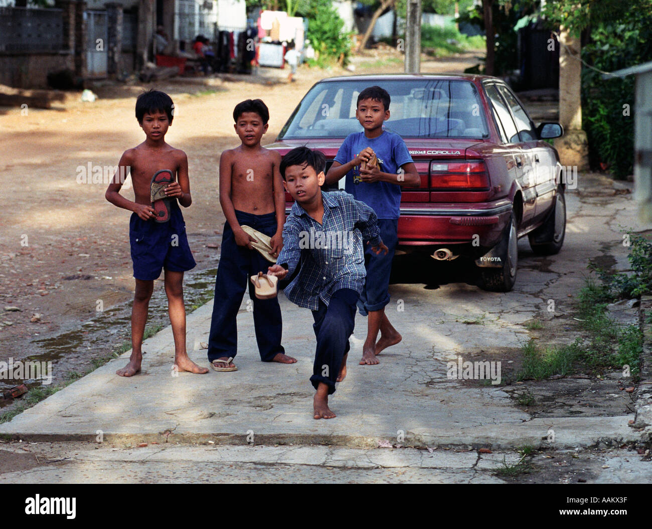 Phnom Penh boys playing Stock Photo - Alamy