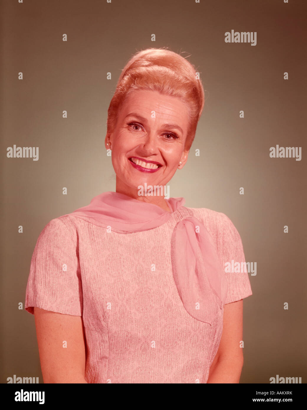 1960s PORTRAIT SMILING BLOND WOMAN PINK BLOUSE SCARF Stock Photo - Alamy