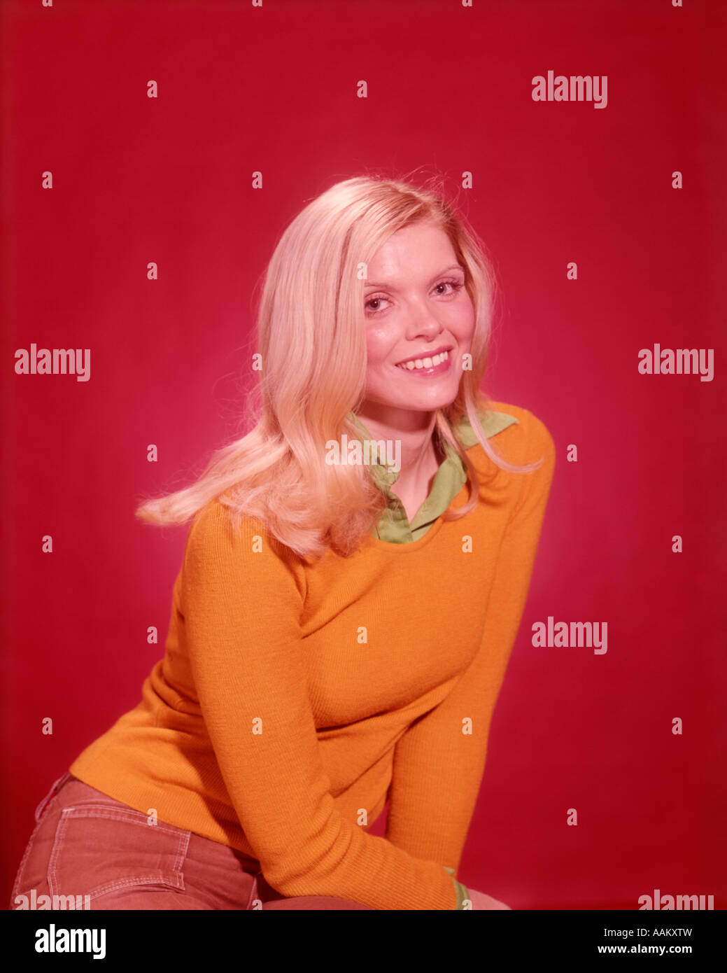 1960s PORTRAIT SMILING BLOND WOMAN GOLD SWEATER Stock Photo - Alamy
