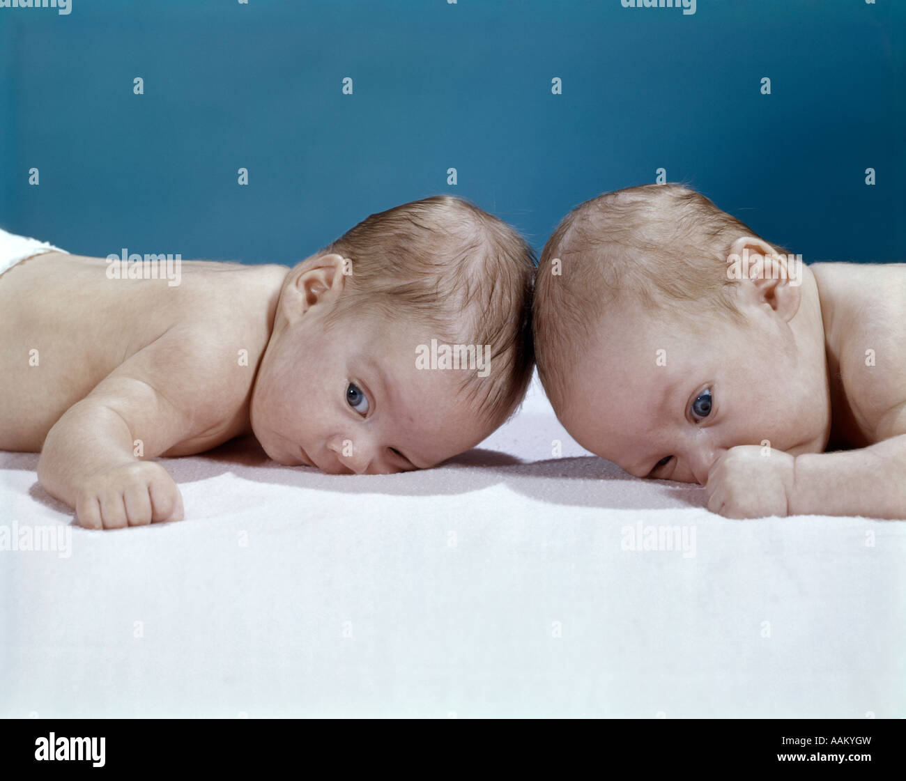 1960s INFANT BABIES CHILDREN IDENTICAL TWINS Stock Photo - Alamy