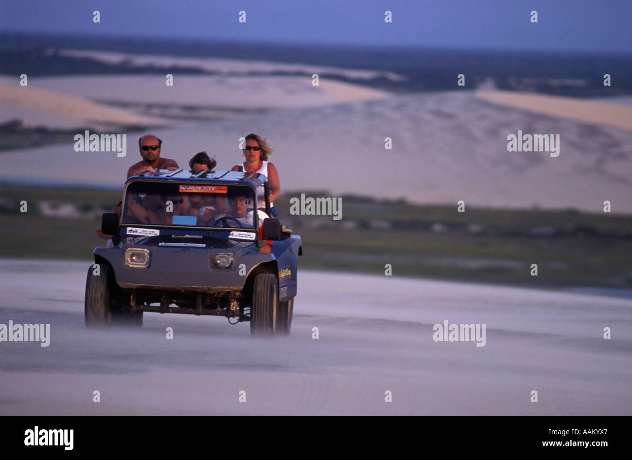 Travel and fun Tourists at buggy cars bugre in the dunes of ...