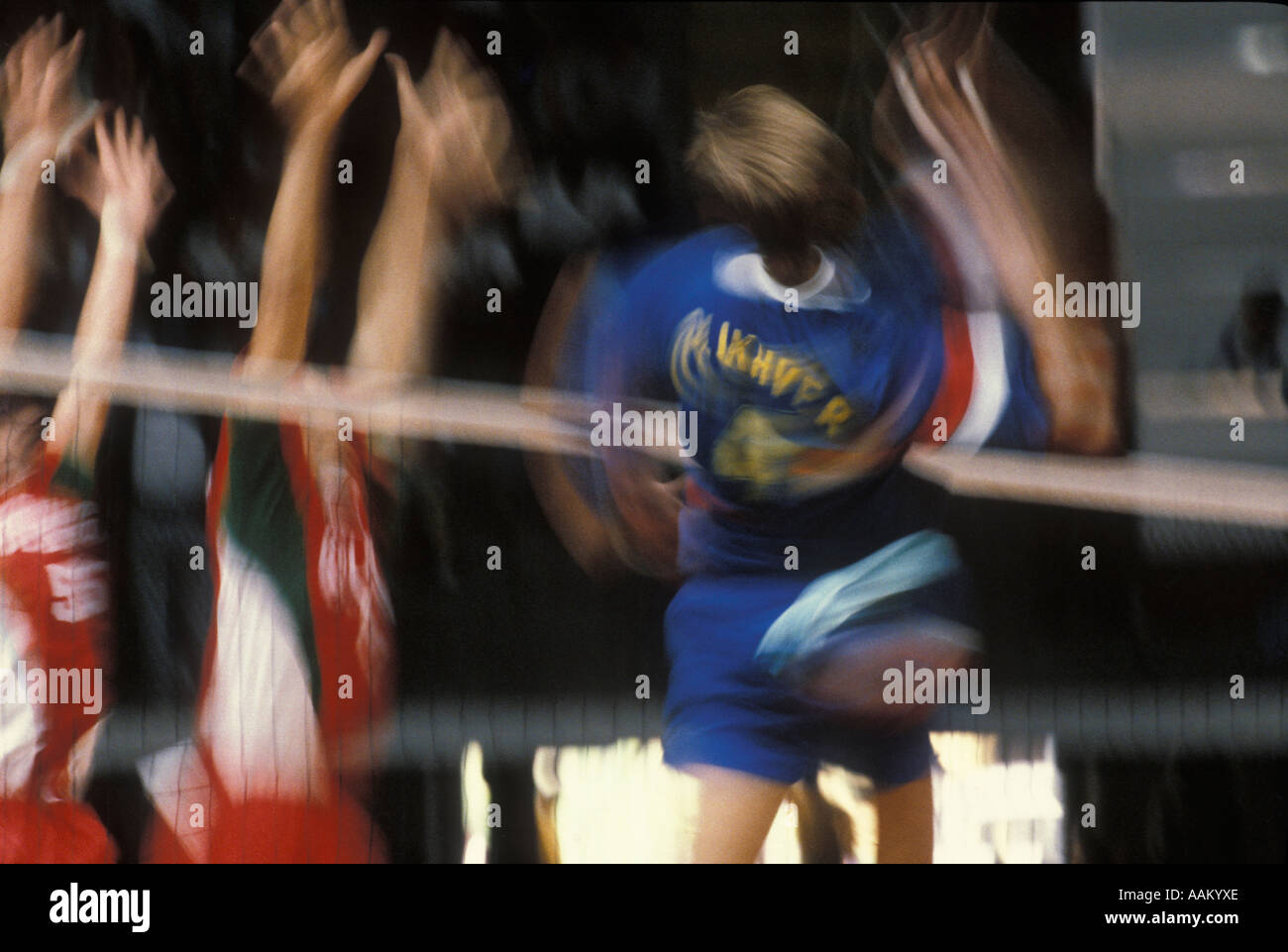 volleyball an attacking move characterized by a forward thrust of the ...