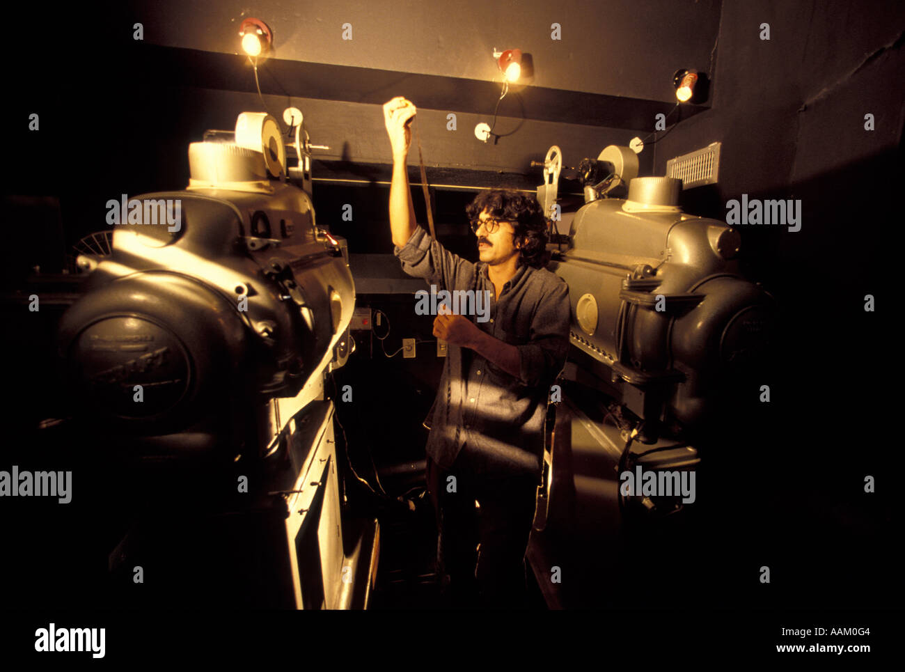 Movie projector operator Stock Photo - Alamy
