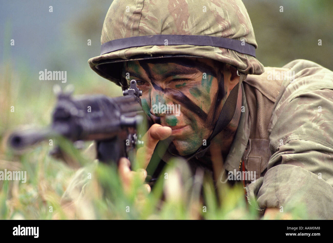 Soldier aiming and shooting Stock Photo - Alamy