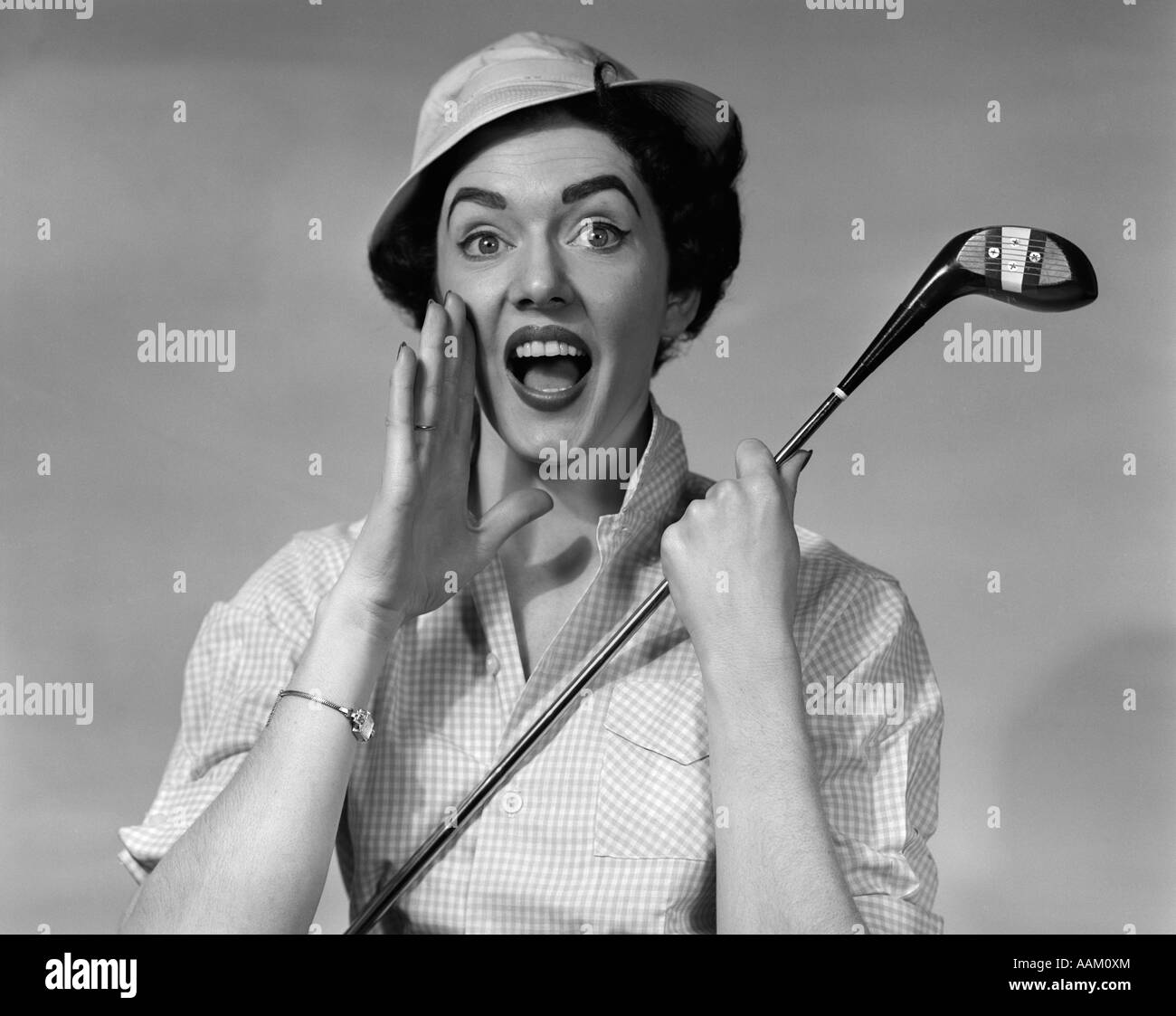 1950s WOMAN HAND UP TO MOUTH SCREAMING YELLING FORE HOLDING GOLF CLUB ...