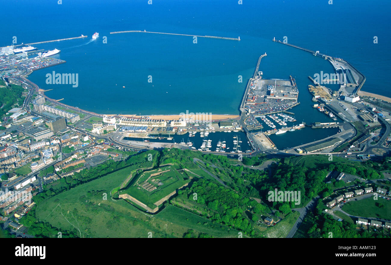 Aerial view of Dover harbour with Castle in foreground Kent England ...