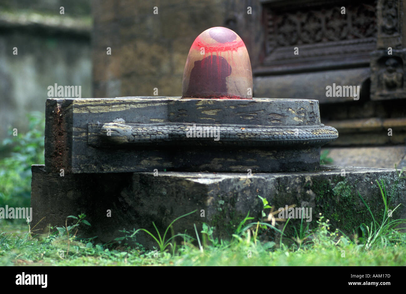 A SHIVA LINGAM stone phallus female counterpart with TIKA at ...