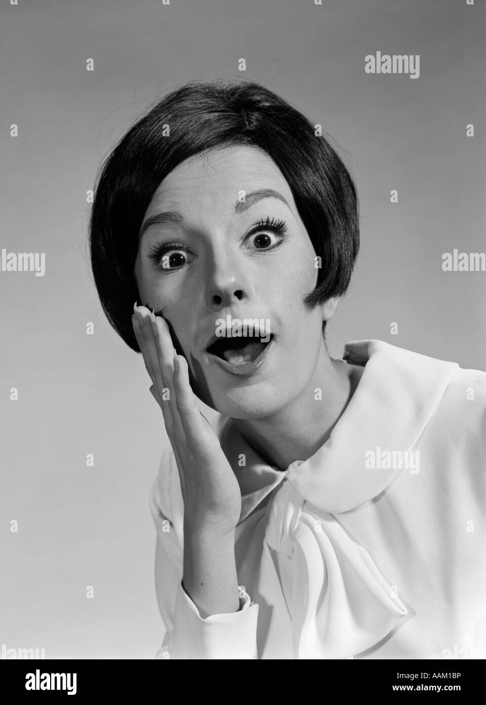 1960s BRUNETTE WOMAN MOUTH AGAPE EYES WIDE HAND TO CHEEK FUNNY FACE ...