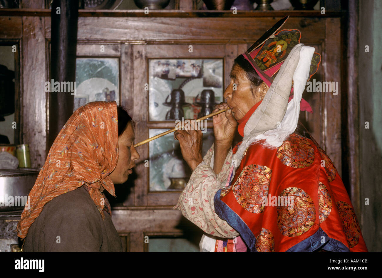 The Buddhist ORACLE of SHALU sucks poison evil spirits from the stomach ...