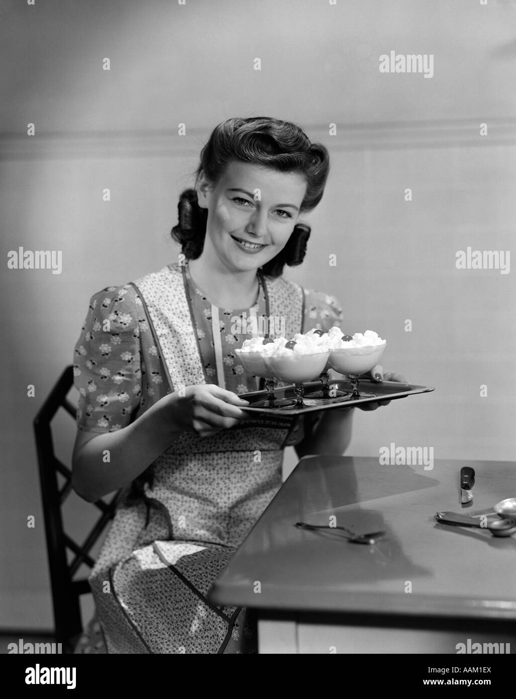 1940's women apron hi-res stock photography and images - Alamy
