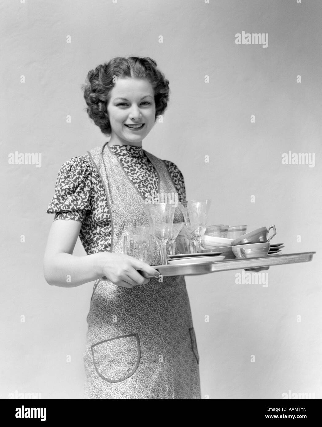 1940's women apron hi-res stock photography and images - Alamy