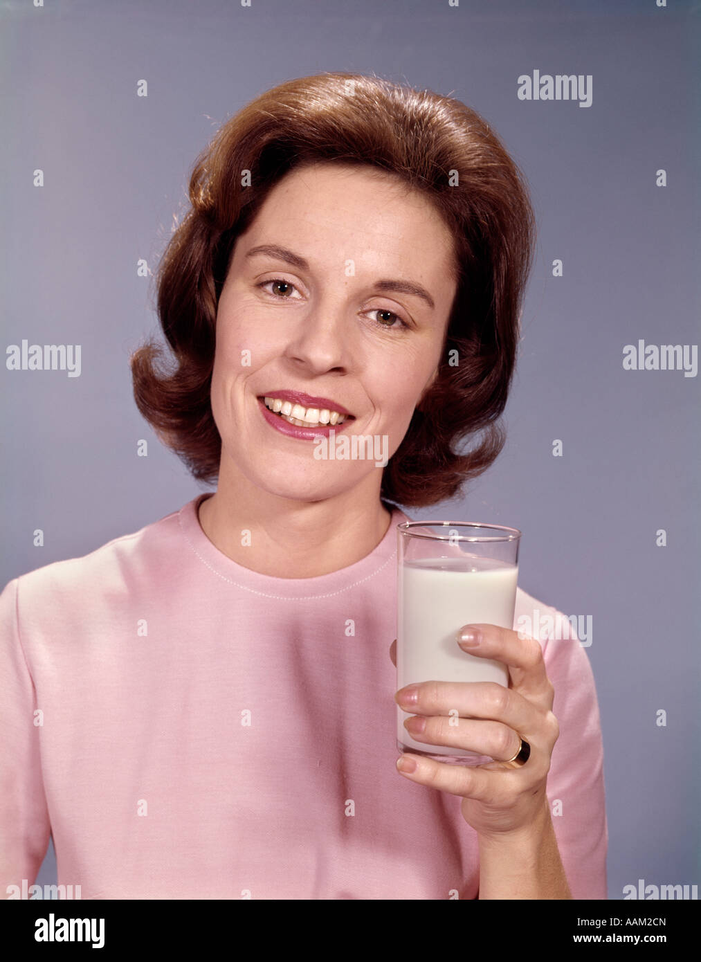 1960s SMILING WOMAN MILK Stock Photo - Alamy