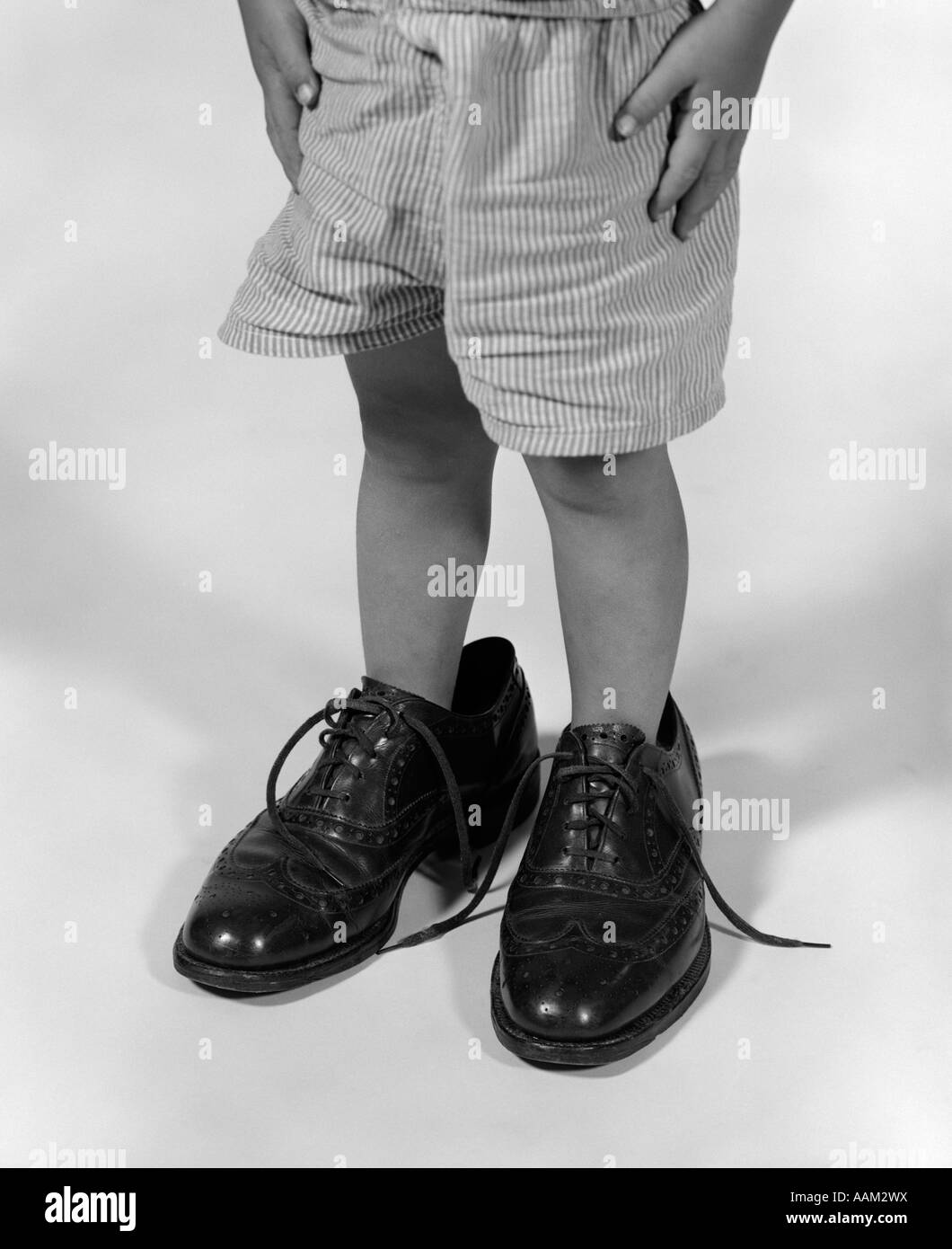 Child shoes Black and White Stock Photos & Images - Alamy