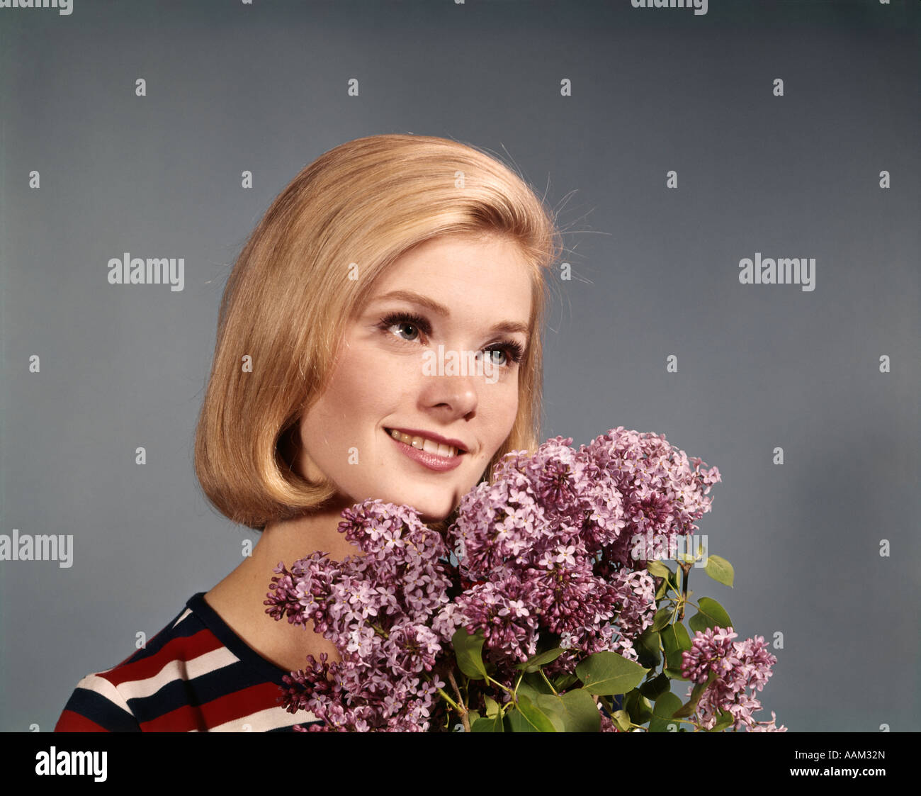 1960s WOMAN FLOWERS BOUQUET BLOND SMILE Stock Photo - Alamy