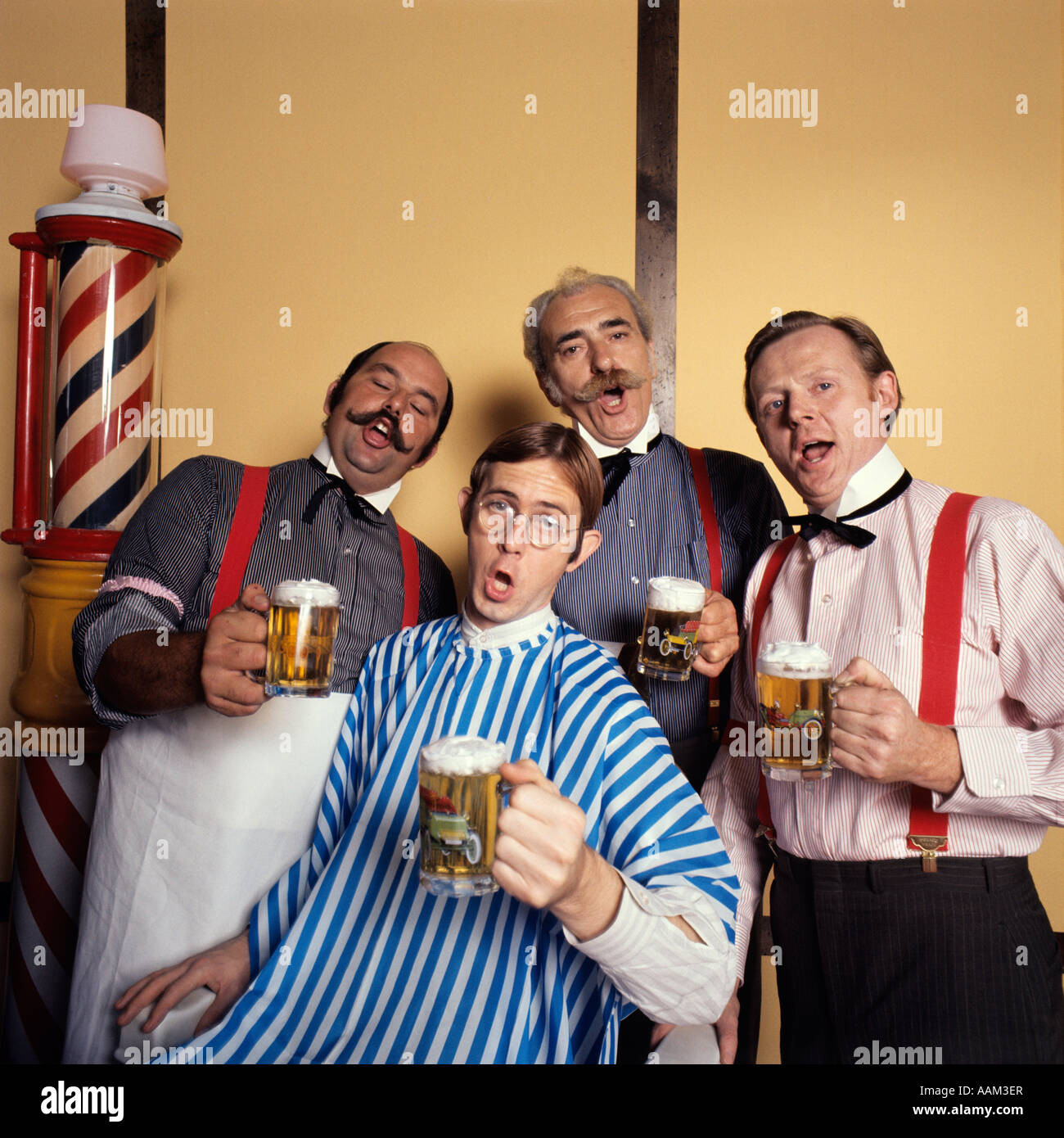 1970s FOUR MEN BARBERSHOP QUARTET SINGING HOLDING MUGS OF BEER Stock ...
