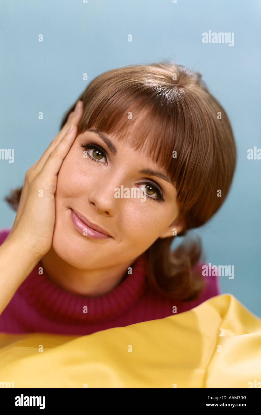 1960s PORTRAIT SMILING BRUNETTE WOMAN HAND TO FACE MOOD THOUGHTFUL ...
