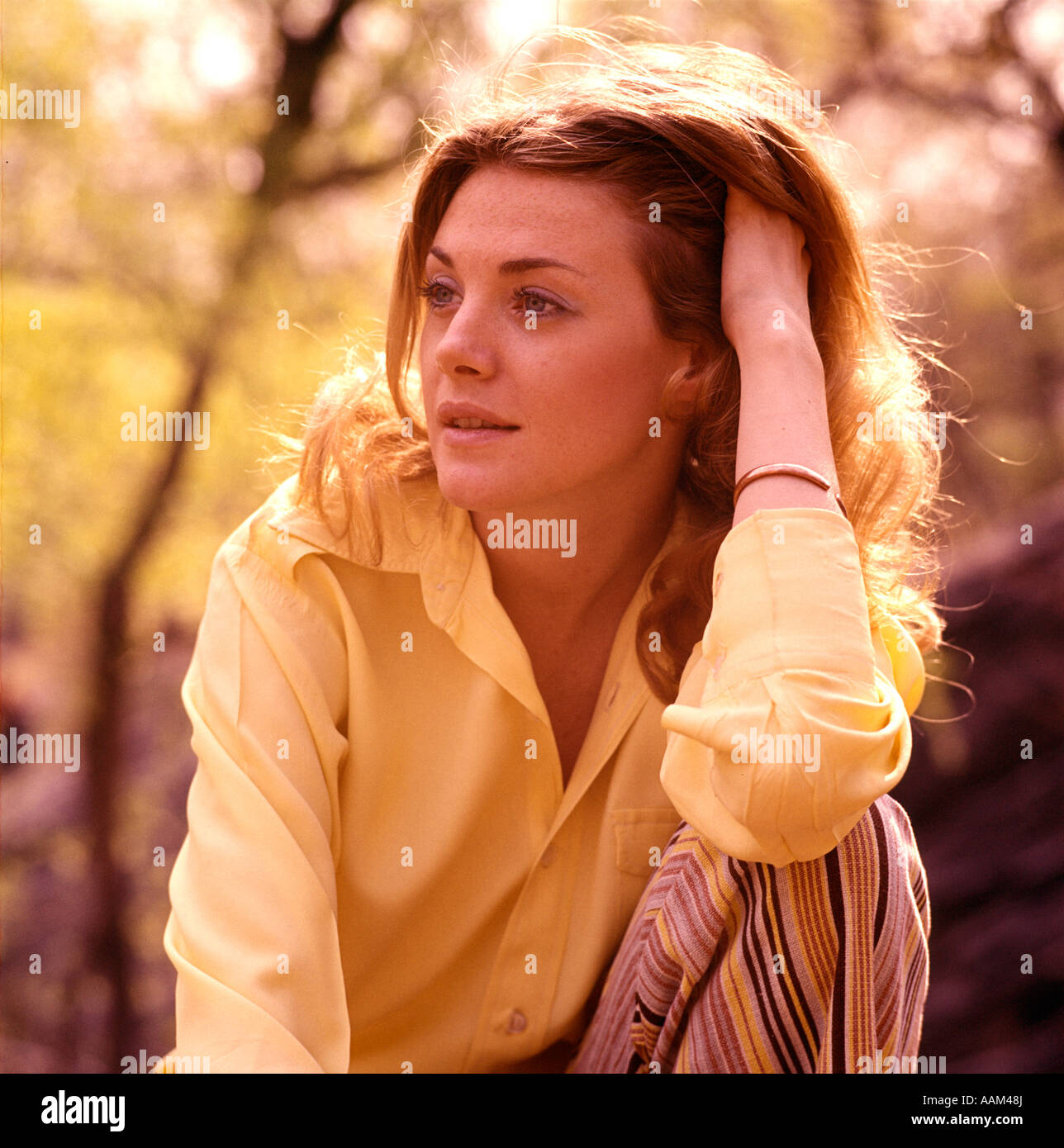 1970s PORTRAIT WOMAN THOUGHTFUL PENSIVE SERIOUS EXPRESSION YELLOW SHIRT ...