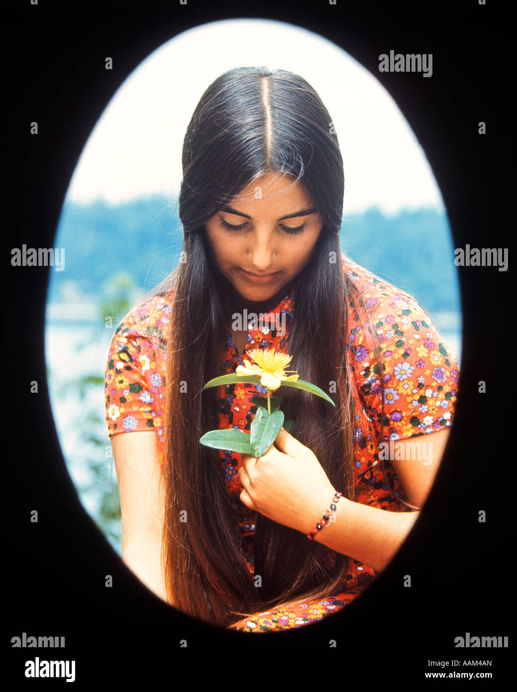 1970s OVAL VIGNETTE TEEN TEENAGE TEENAGER GIRL MOODY EXPRESSION HOLDING ...