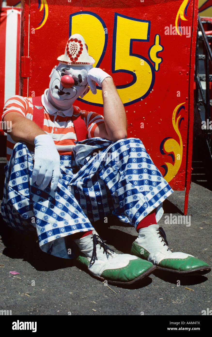 1970s UNHAPPY WORRIED CIRCUS CLOWN SITTING DEJECTED Stock Photo - Alamy