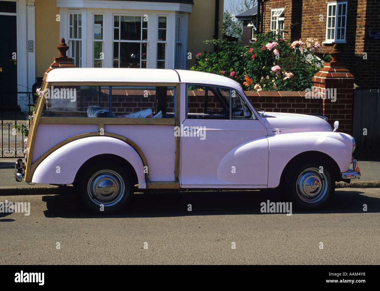 Pink Morris Minor Estate Stock Photo - Alamy