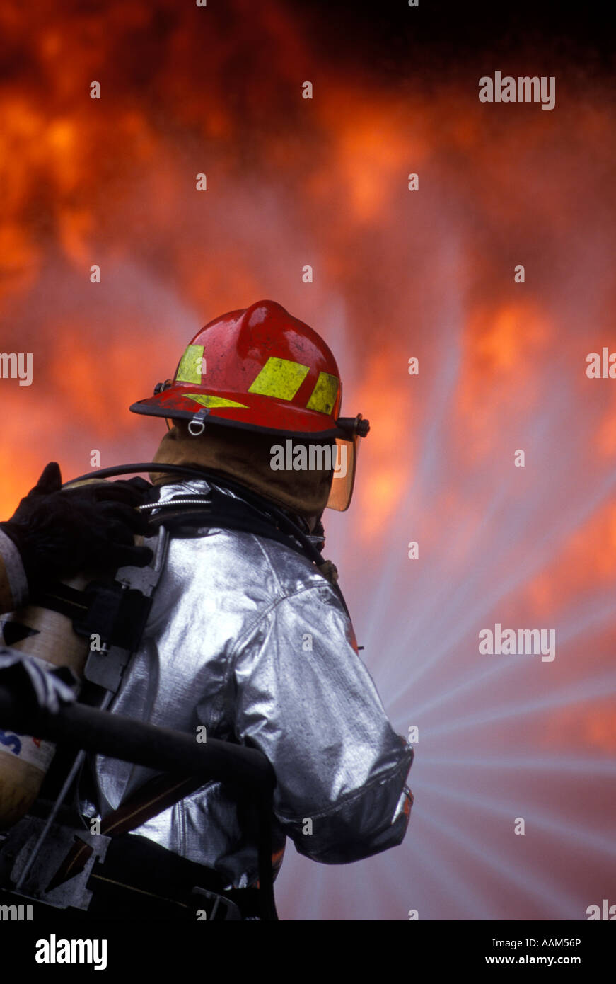 FIREFIGHTER TRAINING AT PIT FIRE Stock Photo - Alamy