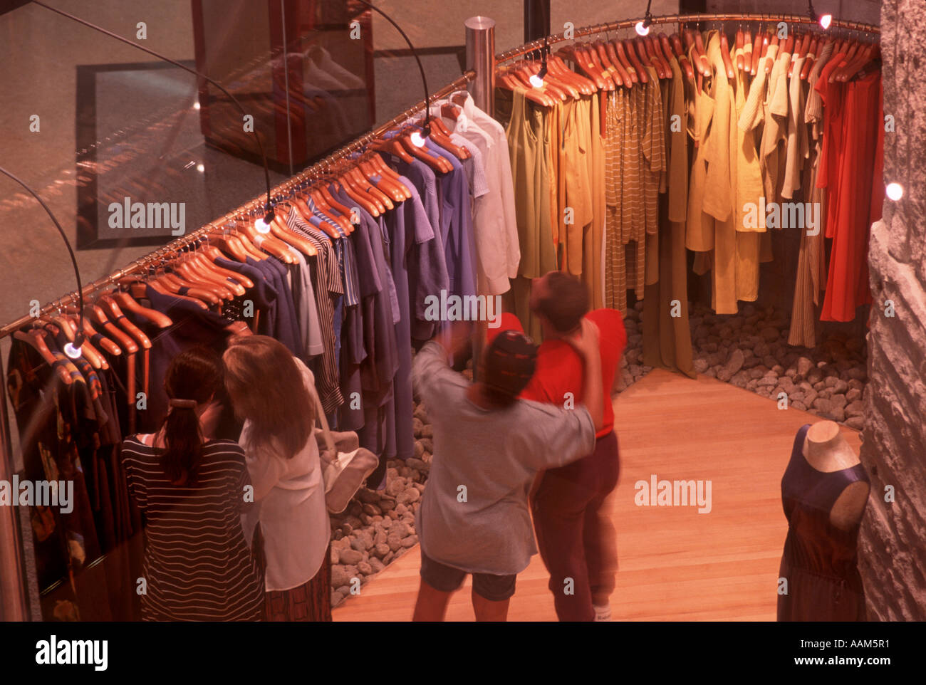 Middle class people buying clothes Stock Photo - Alamy