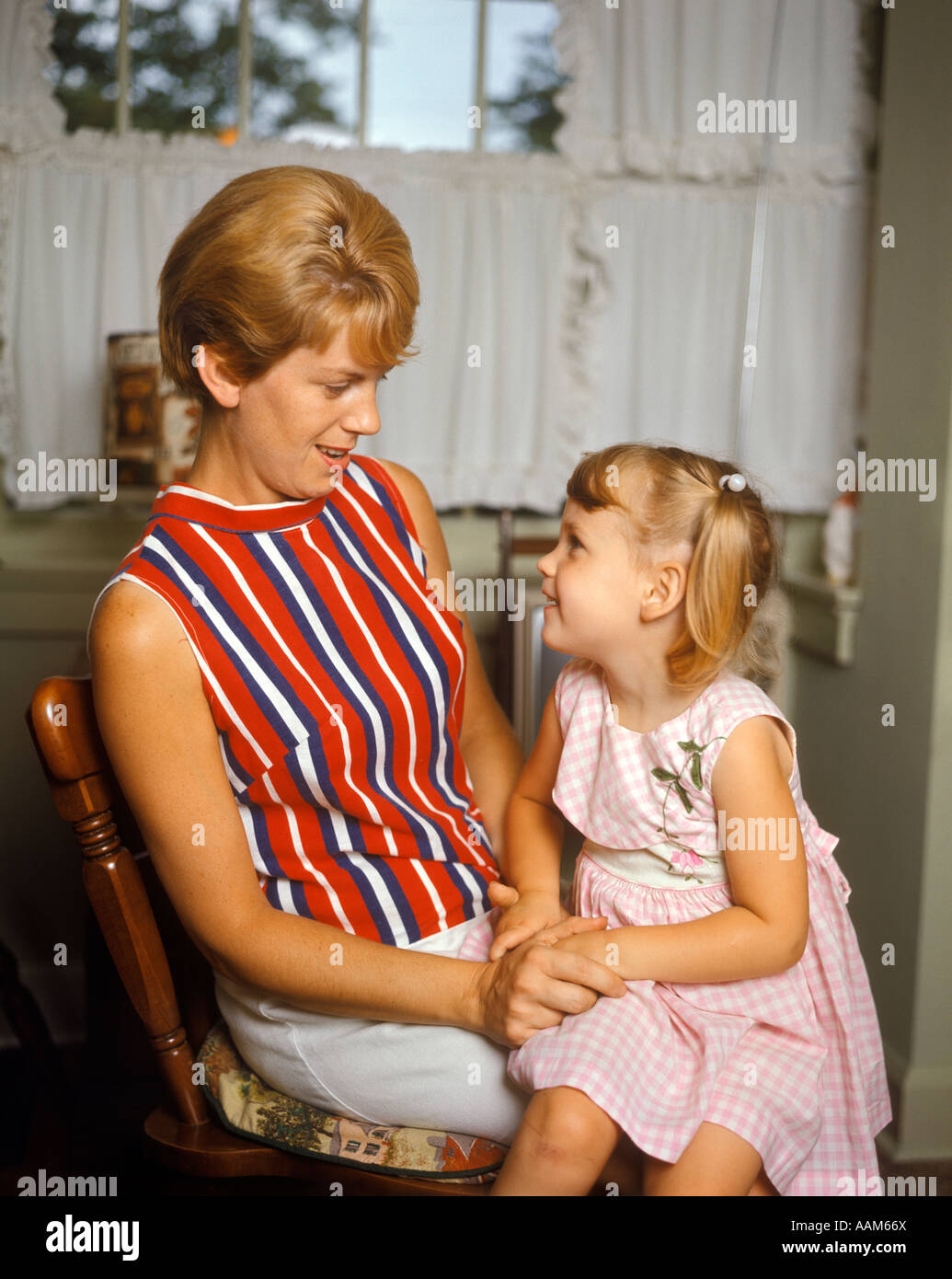 MOTHER AND DAUGHTER WOMAN GIRL SITTING IN LAP SMILING LISTENING 1970 ...