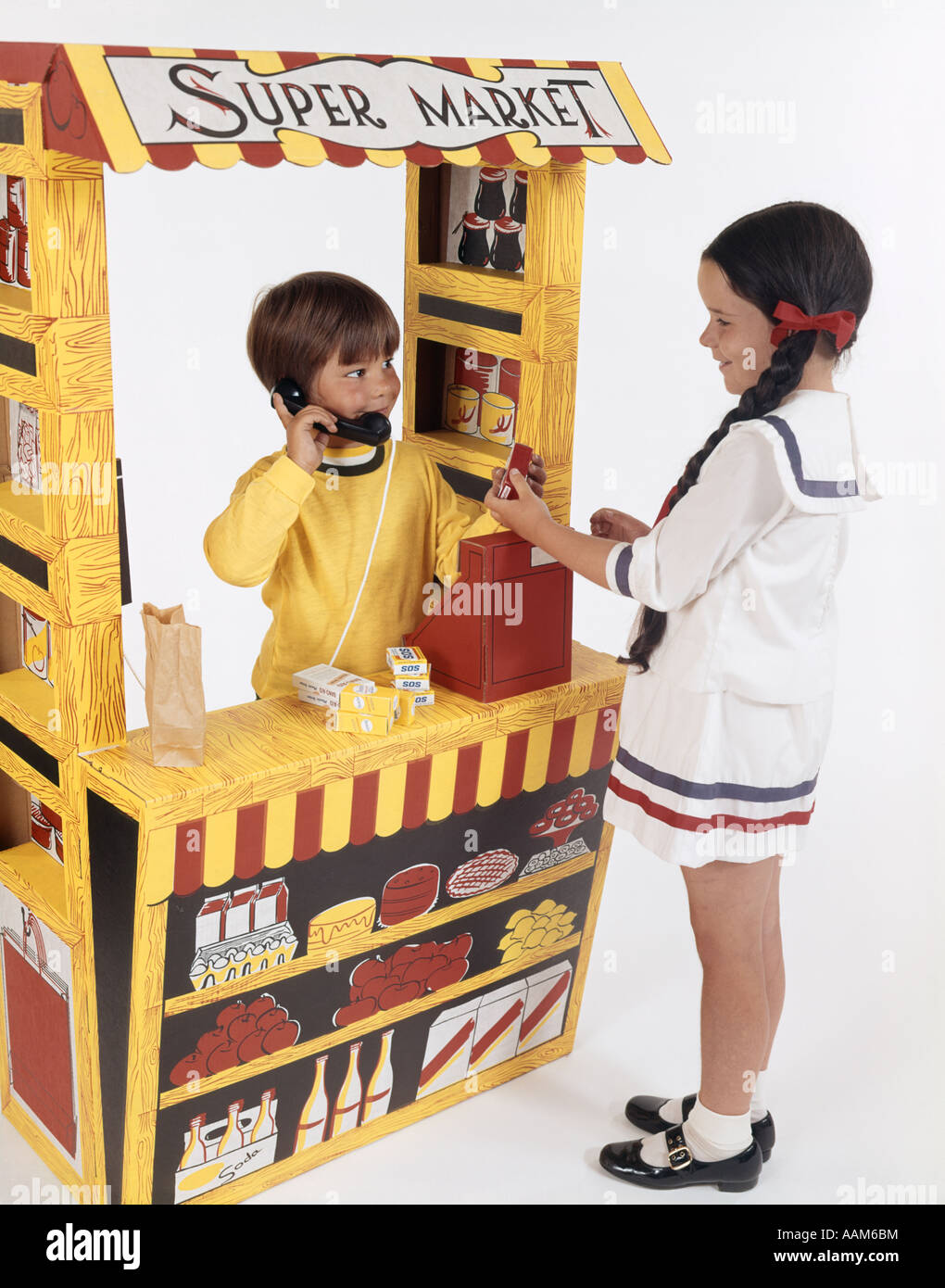 1970s TOY GROCERY STORE BOY AS GROCER CASHIER GIRL AS CUSTOMER Stock ...