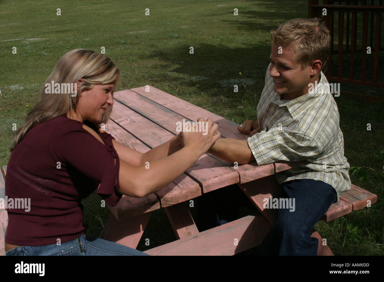 Horizontal Young couple having fun Stock Photo - Alamy