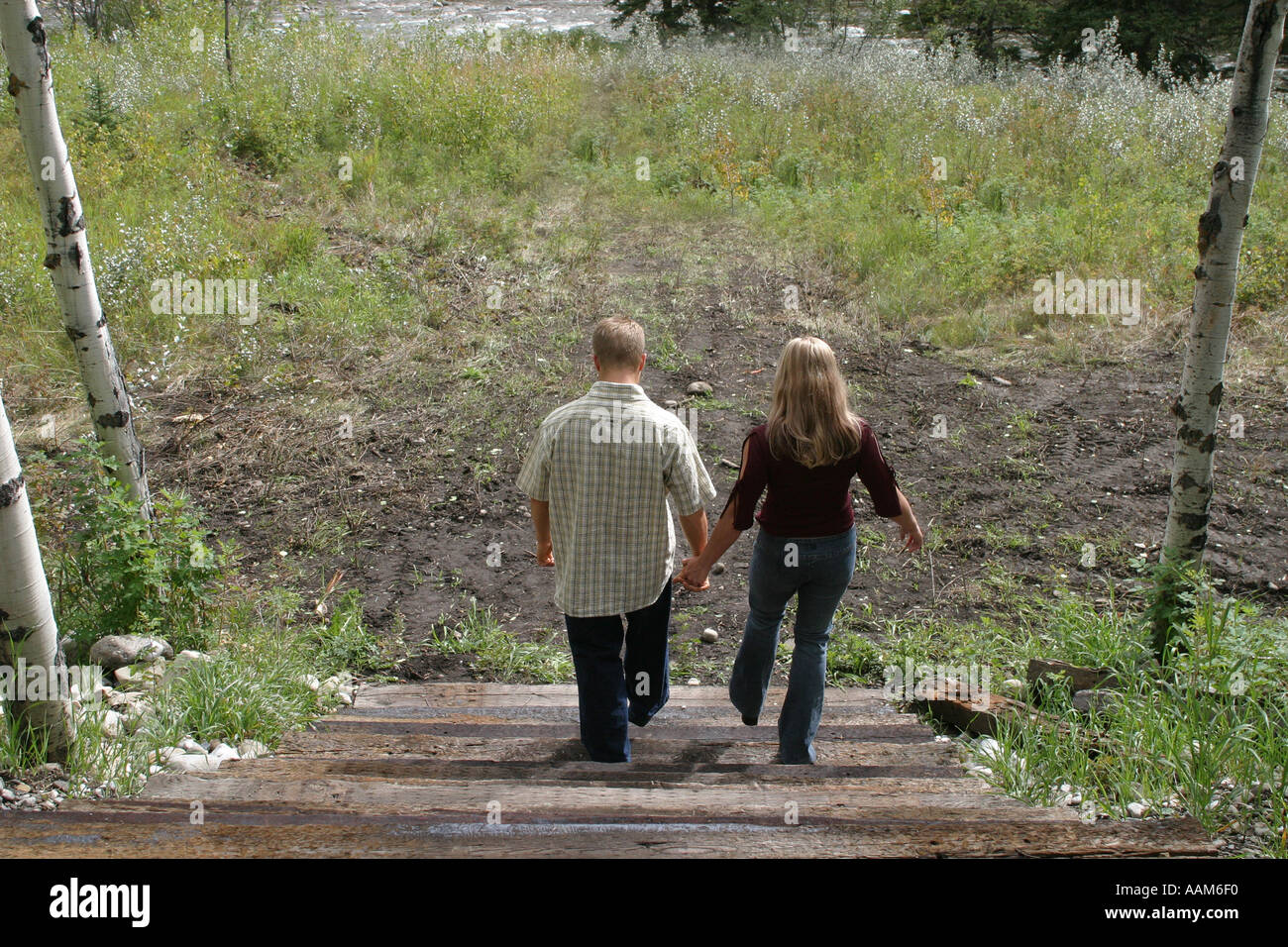 Horizontal Young couple having fun Stock Photo - Alamy