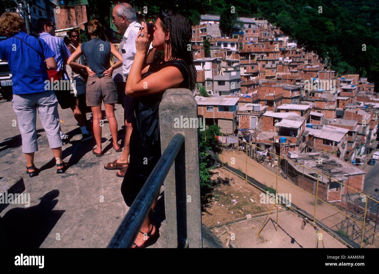 International tourists during sightseeing in a Rio de Janeiro slum ...
