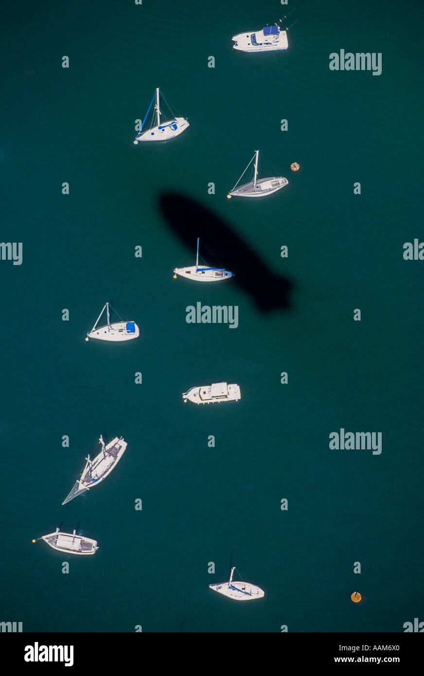Boats and dirigible shadow Stock Photo - Alamy