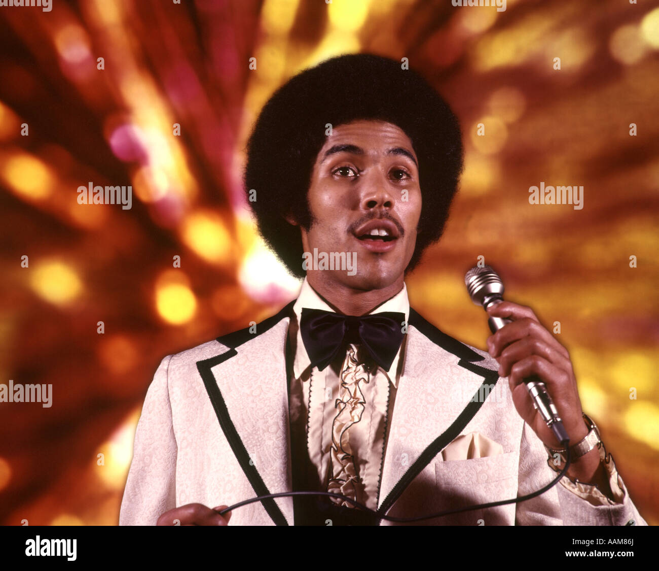 1970 1970s AFRICAN-AMERICAN MAN AFRO HARI DO TUXEDO FASHION SINGING ...