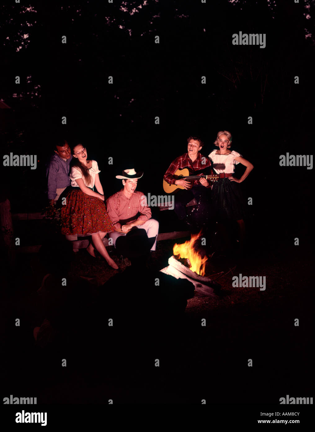 Singing around campfire hi-res stock photography and images - Alamy