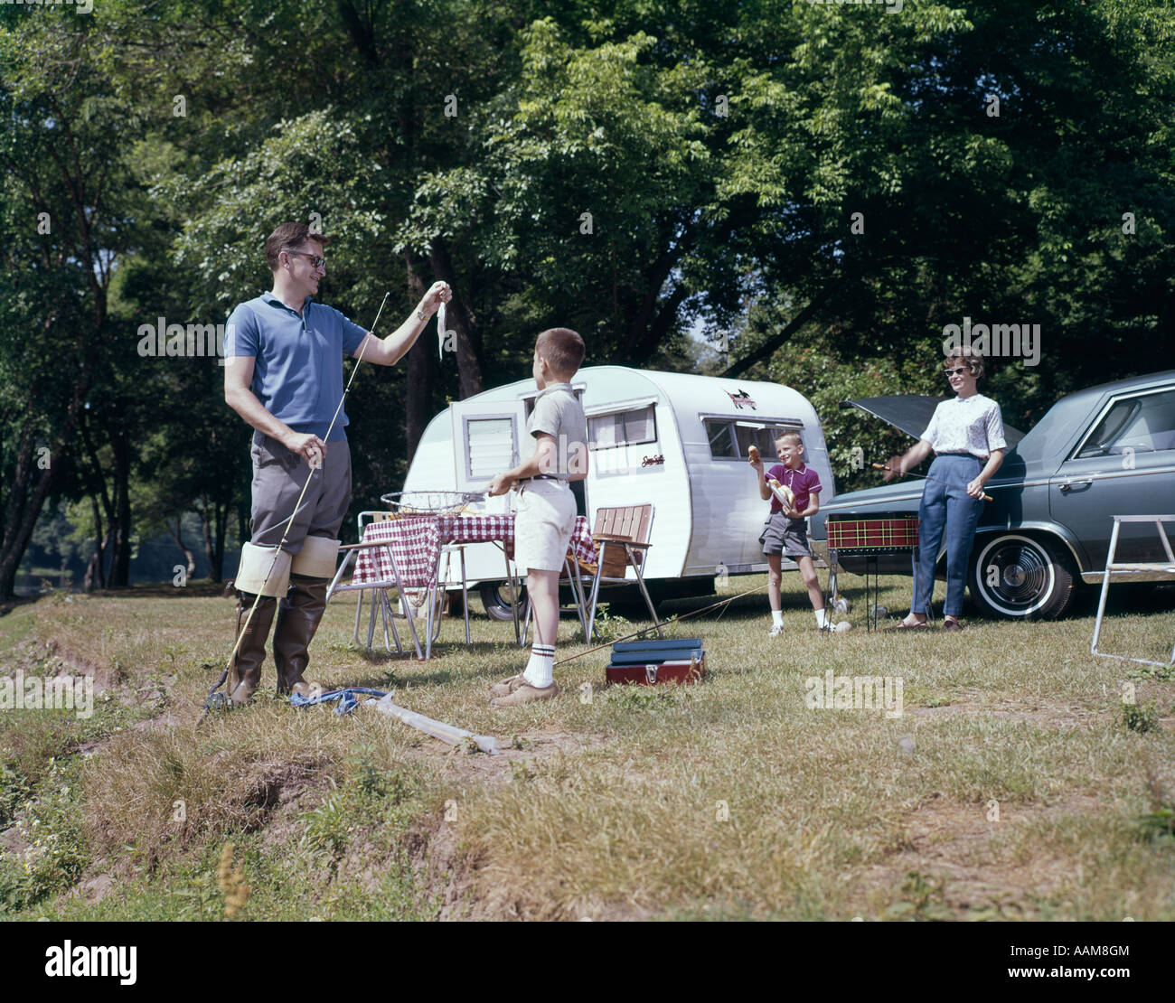 1960 1960s RETRO FAMILY CAMPING TRAILER RV FISHING PICNIC Stock Photo ...