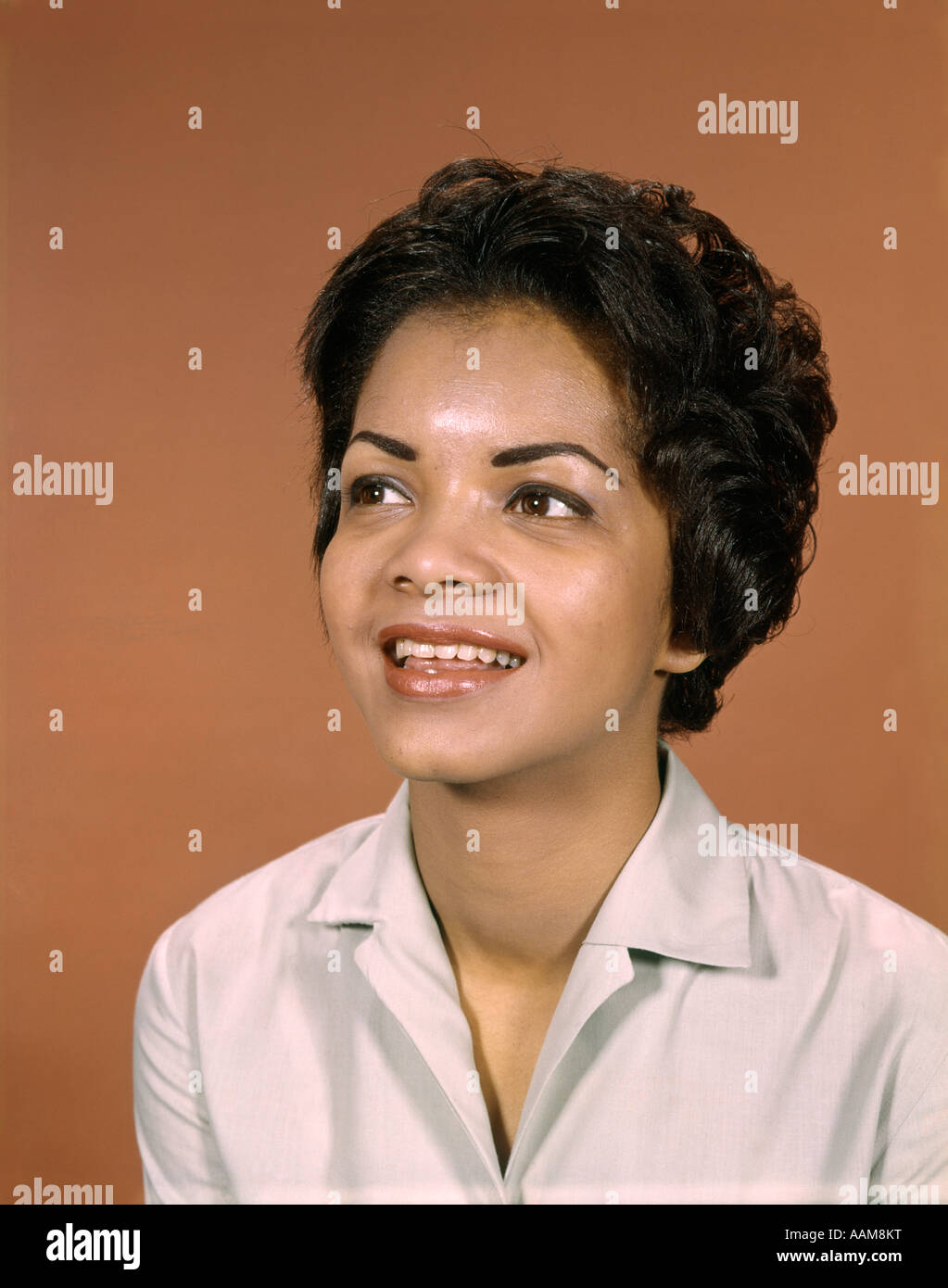 1960s PORTRAIT SMILING AFRICAN-AMERICAN WOMAN LOOKING TO SIDE Stock ...