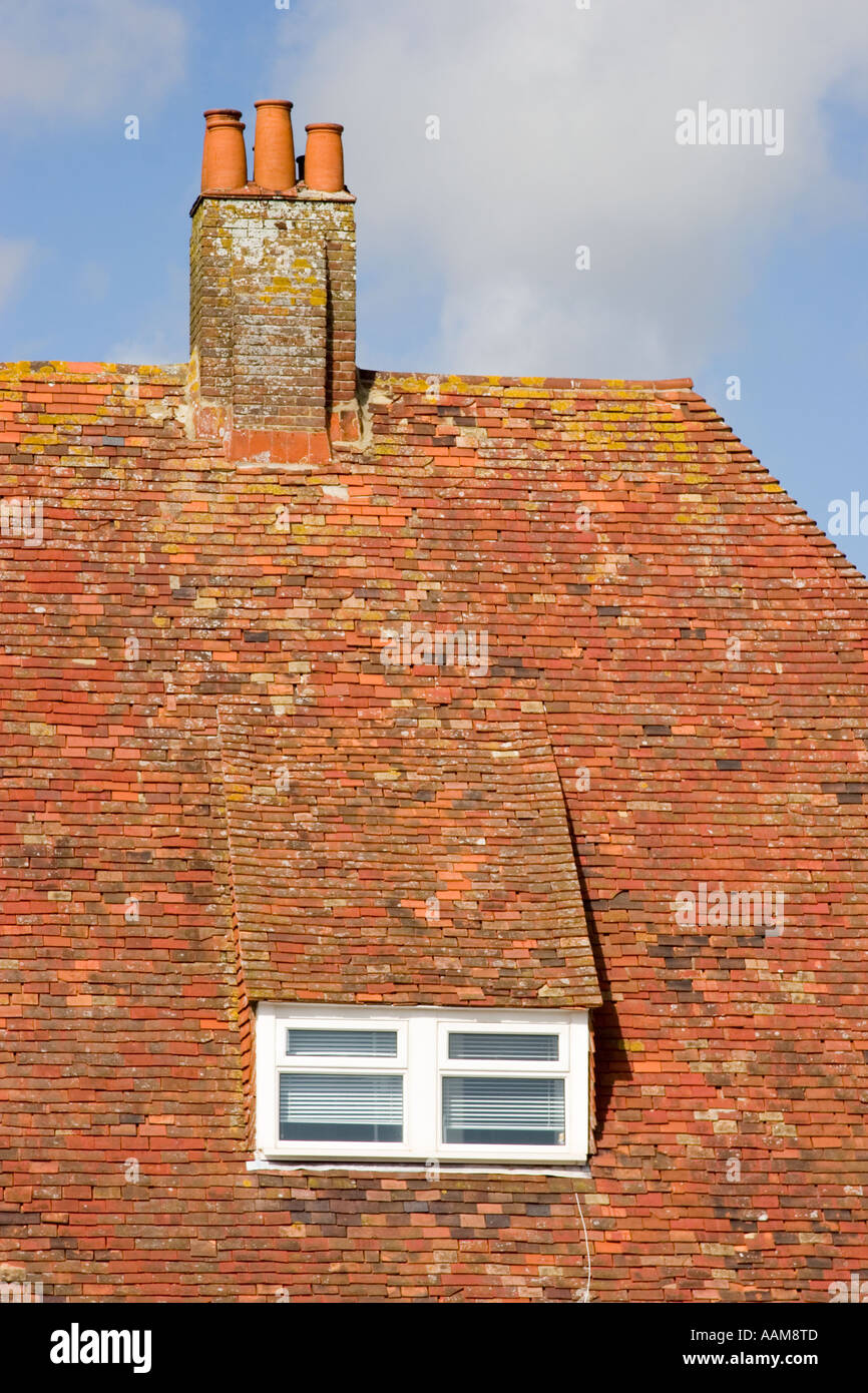 Roof and dormer window of tiled house in East Sussex Stock Photo - Alamy